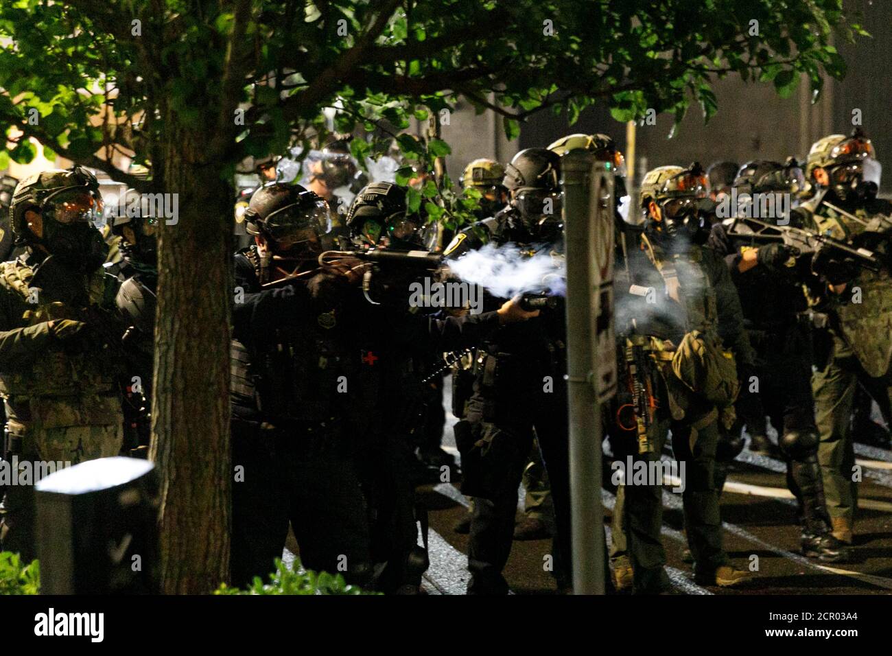 Portland, USA. 18th Sep, 2020. Federal SWAT teams fire on demonstrators ...