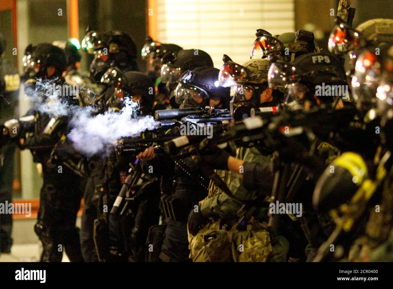 Portland, USA. 18th Sep, 2020. Federal SWAT teams fire on demonstrators ...