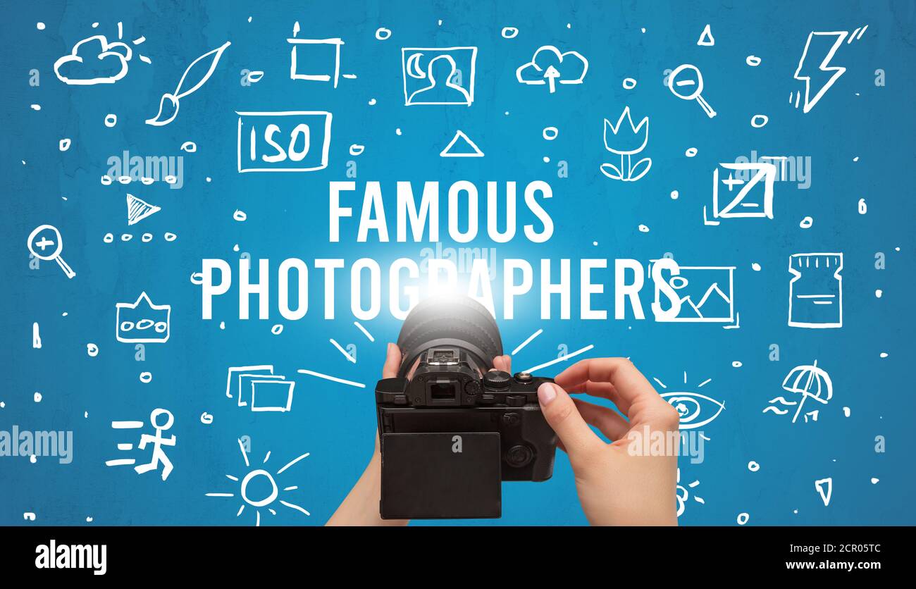 Hand taking picture with digital camera and FAMOUS PHOTOGRAPHERS ...