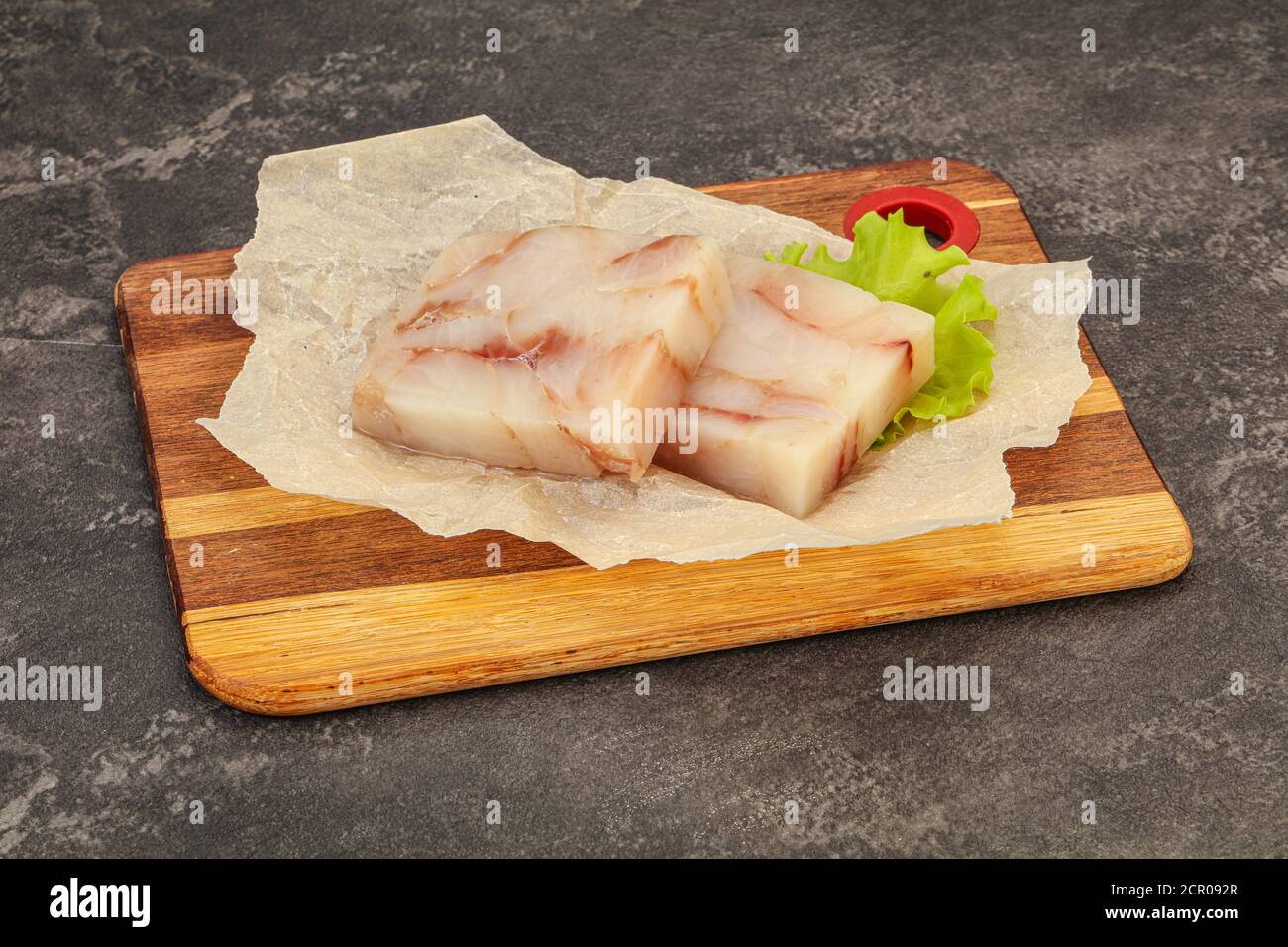 Raw dietary pollock fish fillet for cooking Stock Photo - Alamy