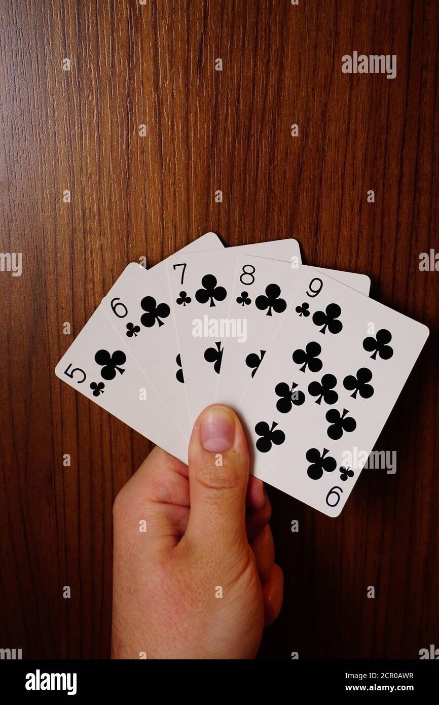 Four aces in hand cards hi-res stock photography and images - Alamy