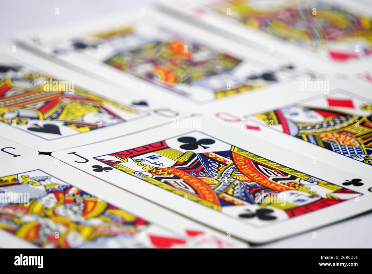 Assorted play cards and combinations on isolated white background close ...