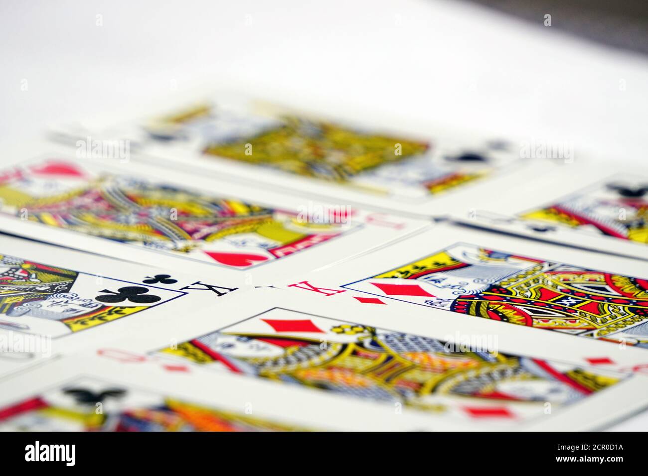 Assorted play cards and combinations on isolated white background close ...