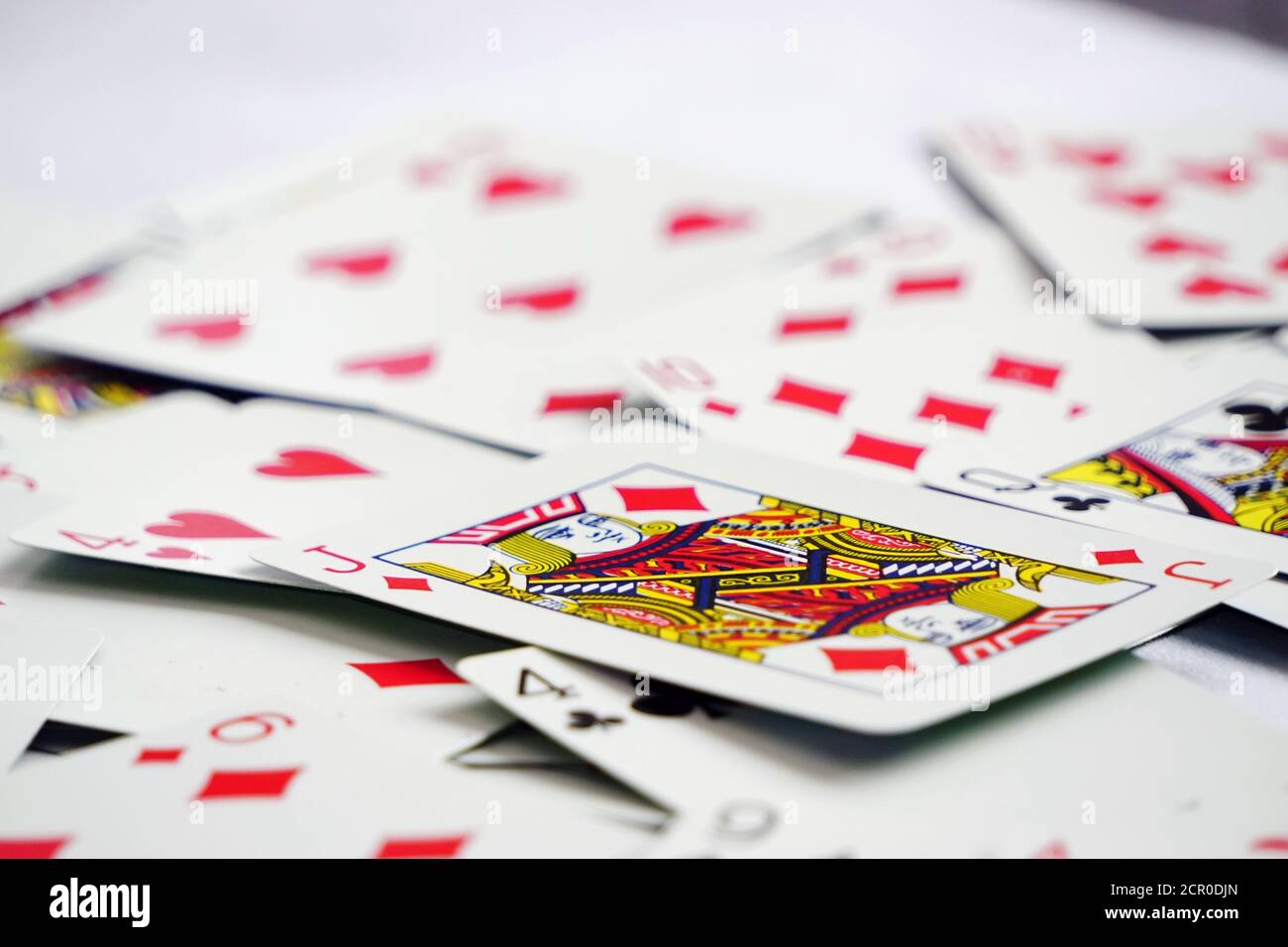 Assorted play cards and combinations on isolated white background close ...