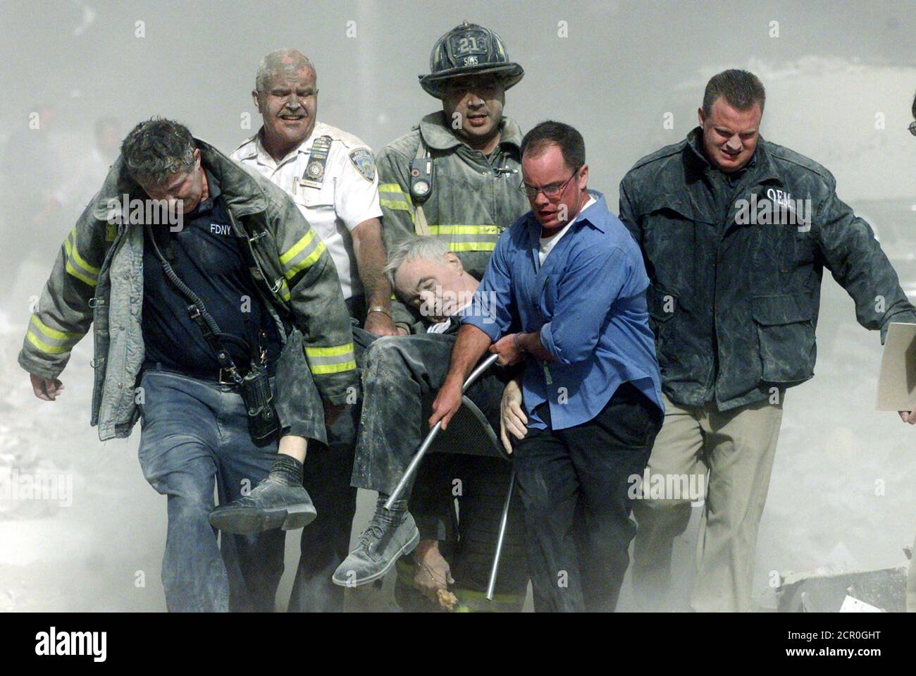 Fireman carrying man hi-res stock photography and images - Alamy