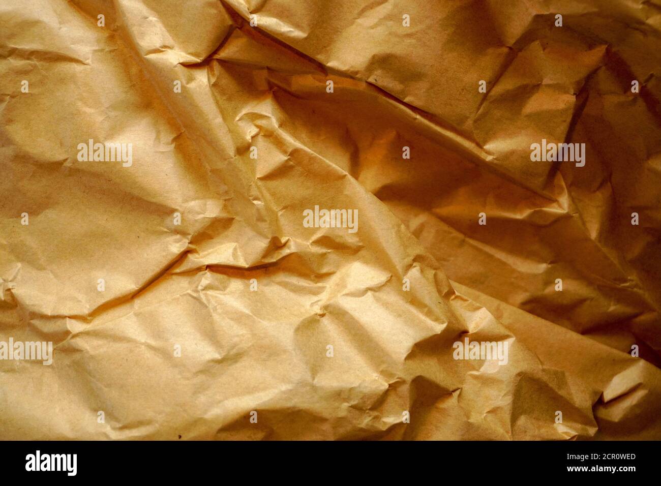 Wrinkled brown paper template texture background Stock Photo - Alamy