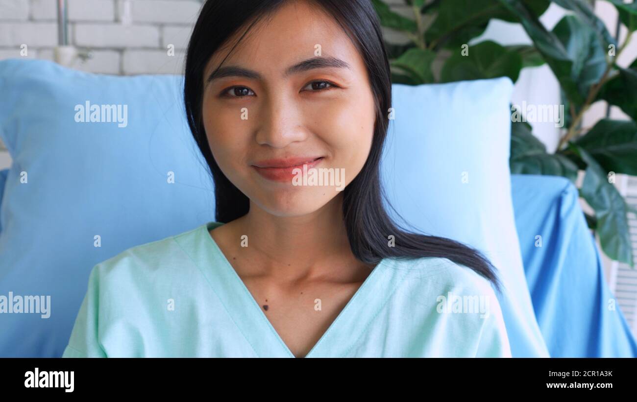 Happy patient getting well improvement at hospital ward . Health care ...