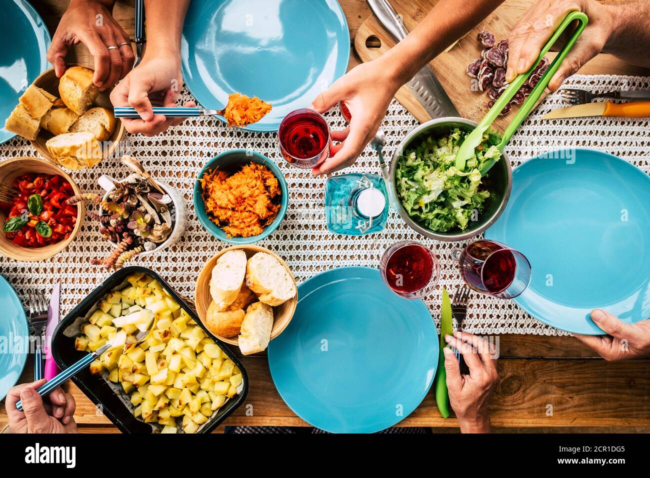 Top vertical coloured view of table full of food and colors - decorated ...