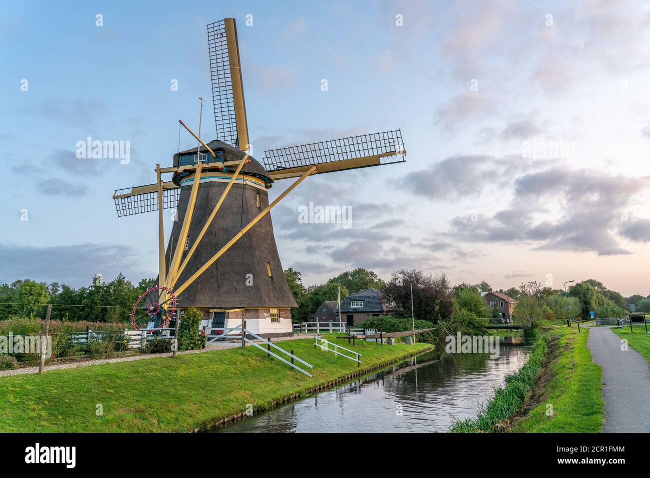 Traditional dutch windmill in a rural landscape Stock Photo - Alamy