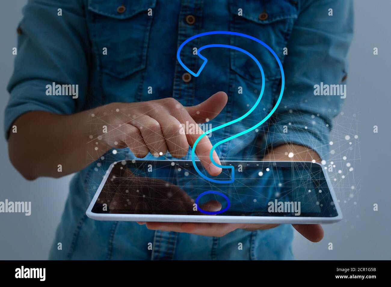 man hand tablet with question mark in screen Stock Photo - Alamy
