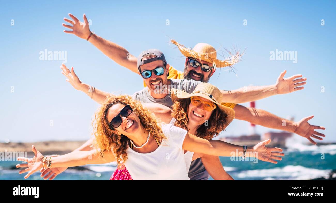 Group of happy people enjoy travel and summer holiday vacation together ...