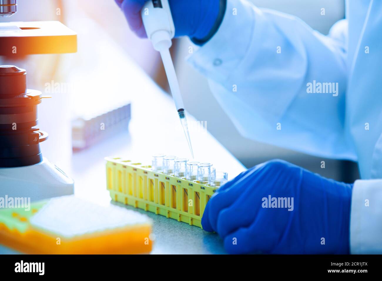 Variable volume multichannel pipette. Medical worker, scientist ...