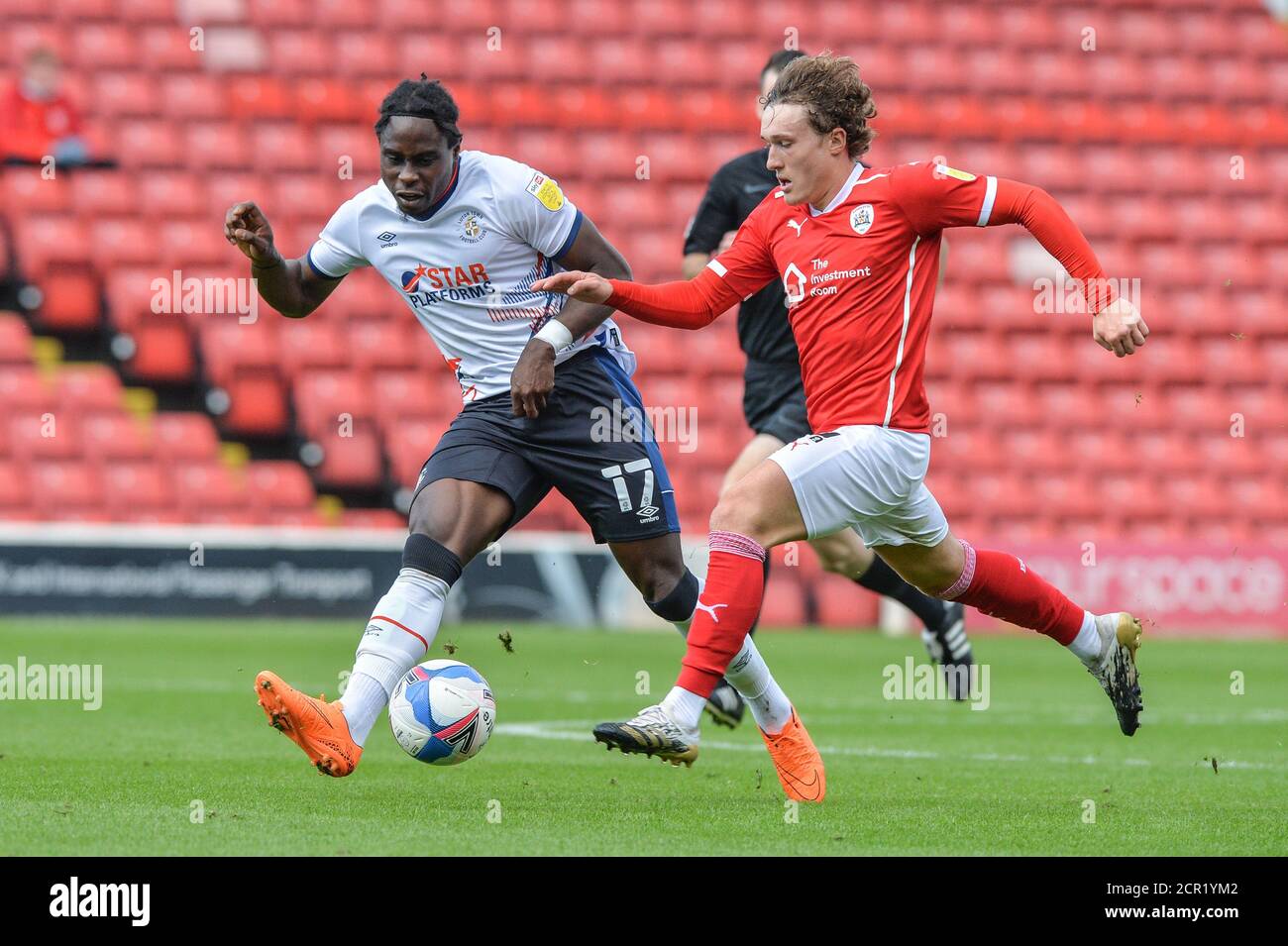 Pelly-Ruddock Mpanzu (17) of Luton Town and Callum Styles (4) of ...