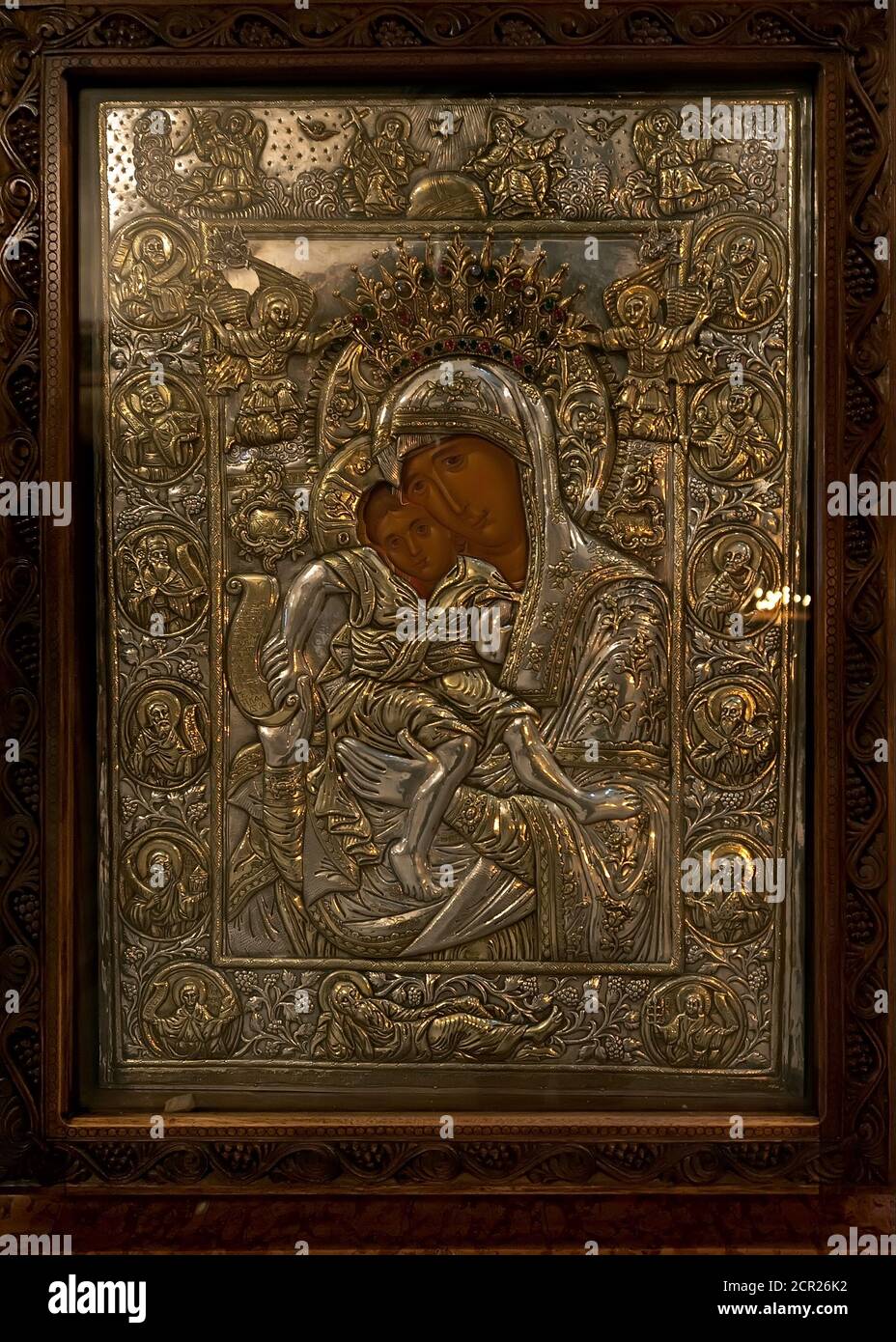 Icon covered in gilded silver riza in the Holy Trinity Cathedral known ...
