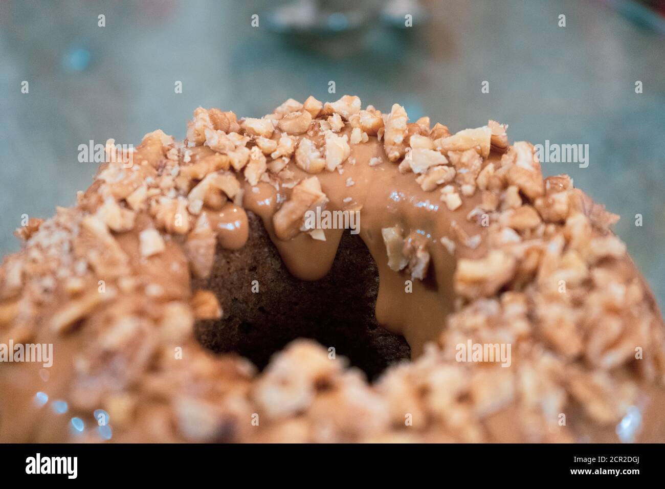 Closeup of a delicious cake with caramel and nuts topping Stock Photo ...