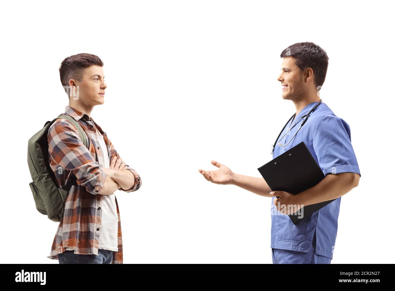 Doctor in a blue uniform talking to a student isolated on white ...