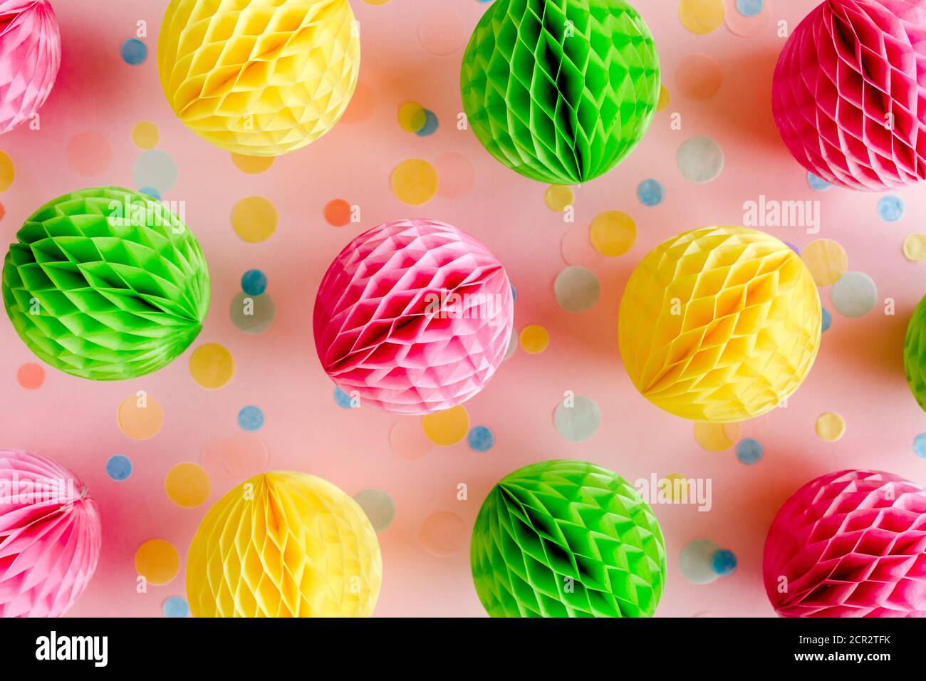 Balloons and confetti on pink background. Birthday, holiday concept ...