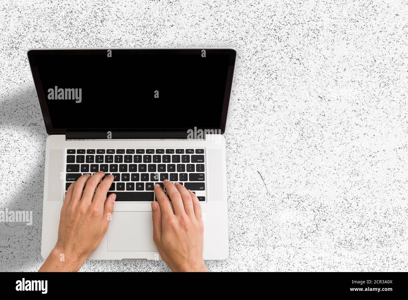 Man hand on laptop keyboard with blank screen monitor Stock Photo - Alamy