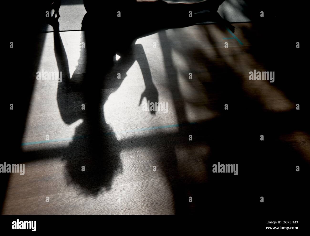 Spinal twist yoga pose in the studio, woman doing yoga asana ardha ...