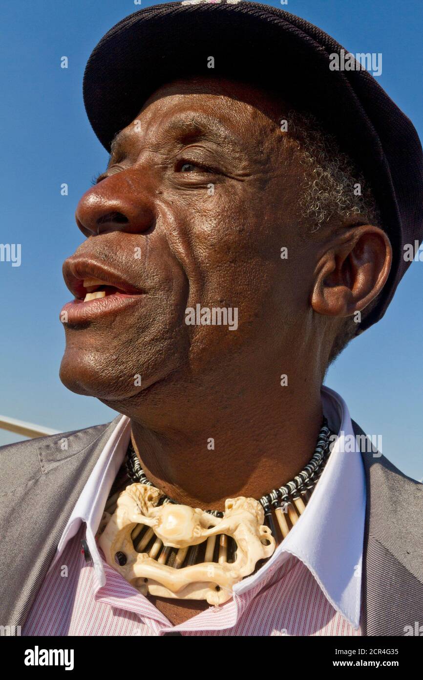Local chief of Mukuni Village, Munokalya Mupotola IV, shows off his ...