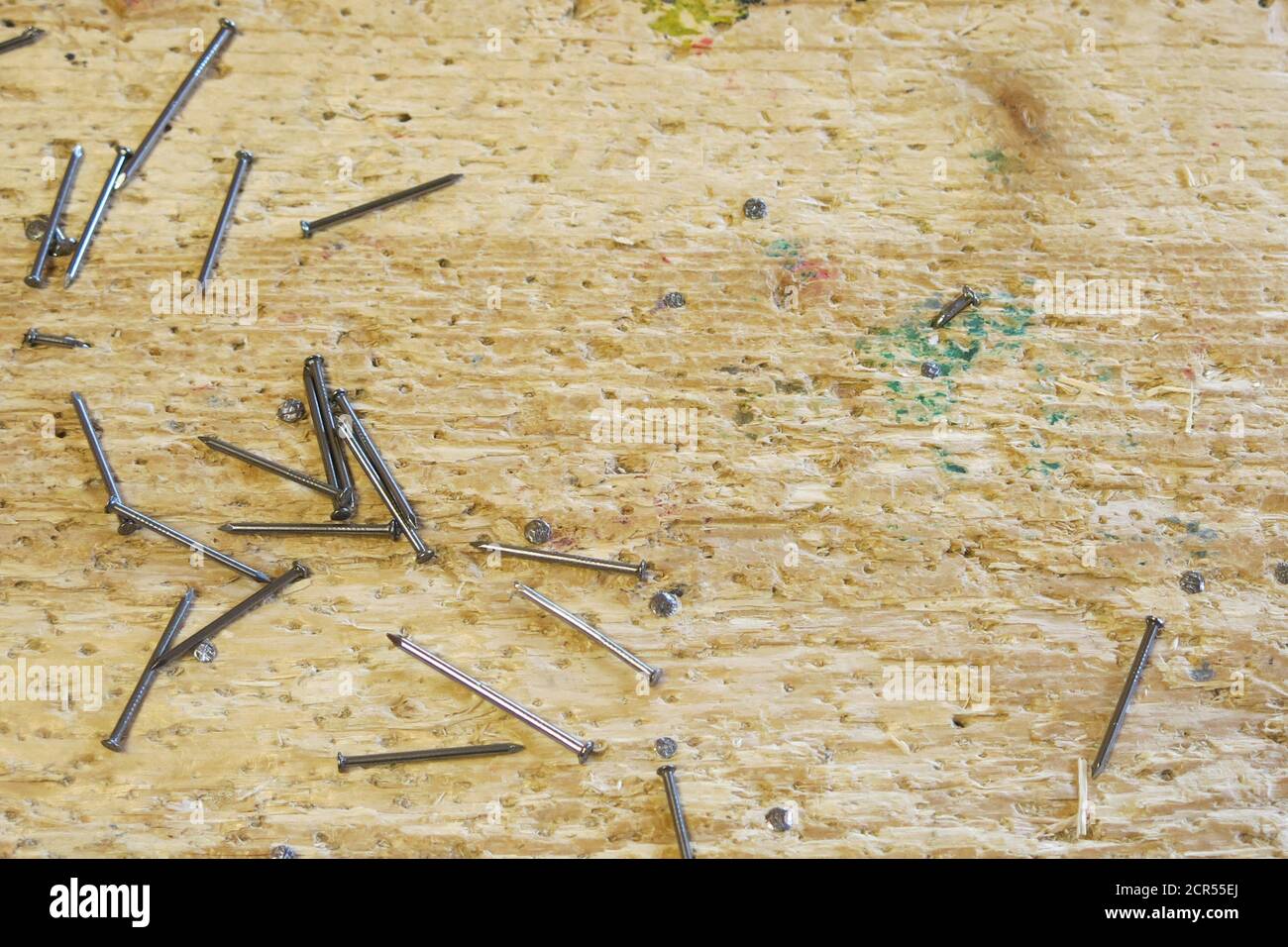 Nails and wood Stock Photo - Alamy