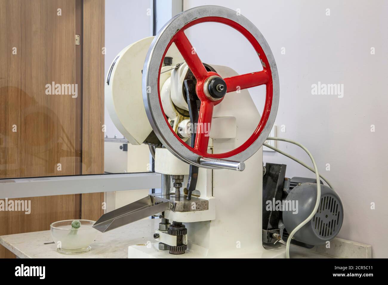 drug capsule and pill press machine in medicine manufacturing factory ...