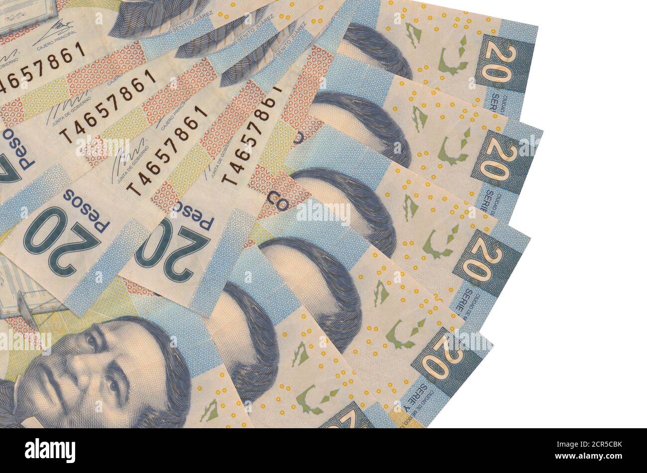 20 Mexican pesos bills lies isolated on white background with copy ...