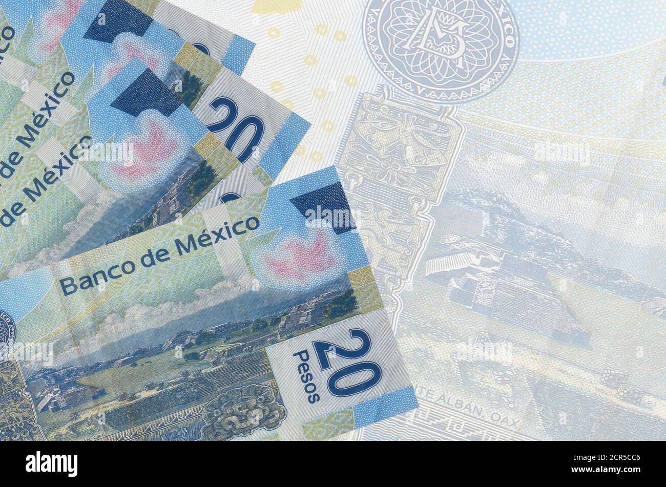 20 Mexican pesos bills lies in stack on background of big semi ...