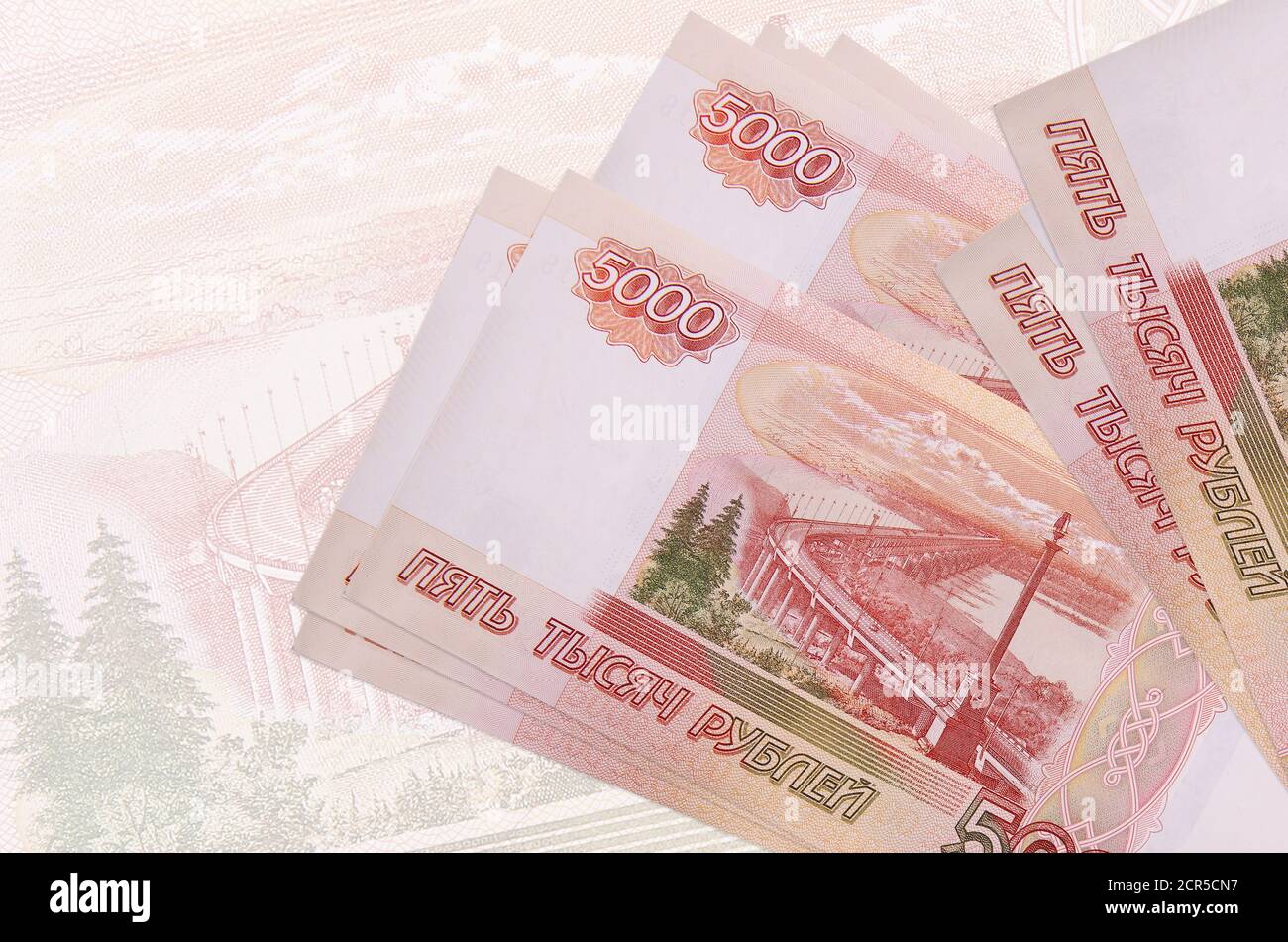 5000 russian rubles bills lies in stack on background of big semi ...