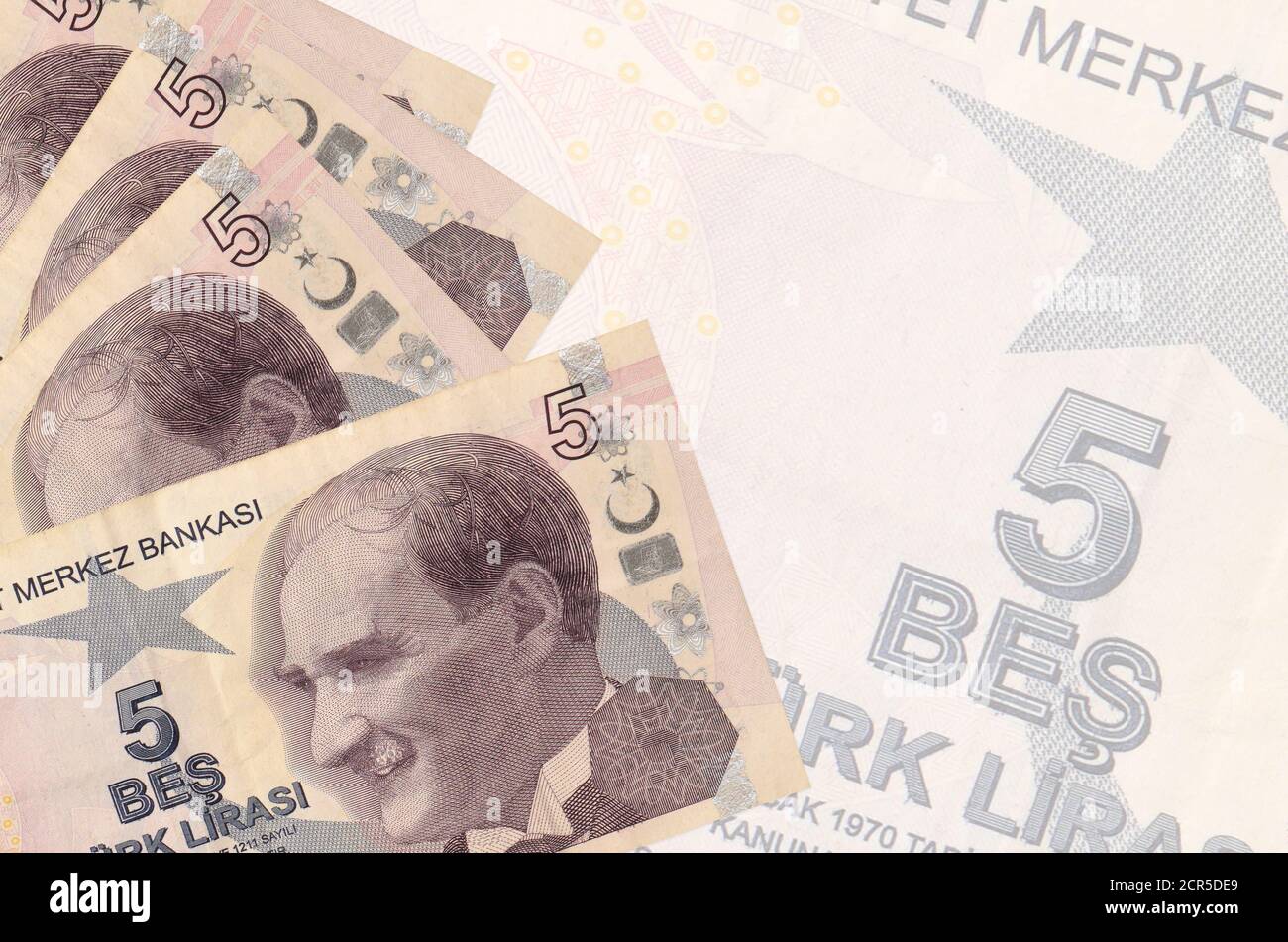 5 Turkish liras bills lies in stack on background of big semi ...