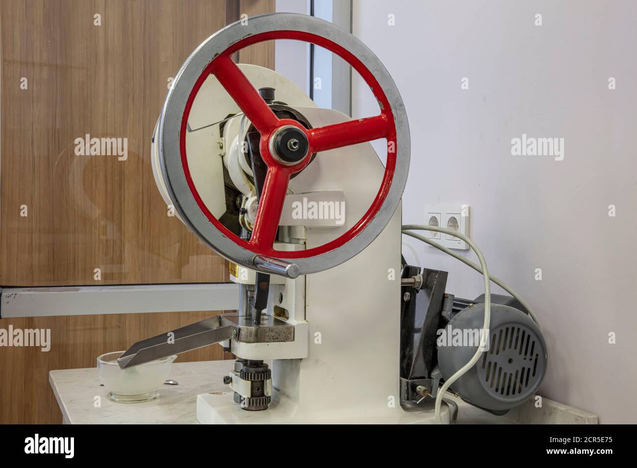 drug capsule and pill press machine in medicine manufacturing factory ...