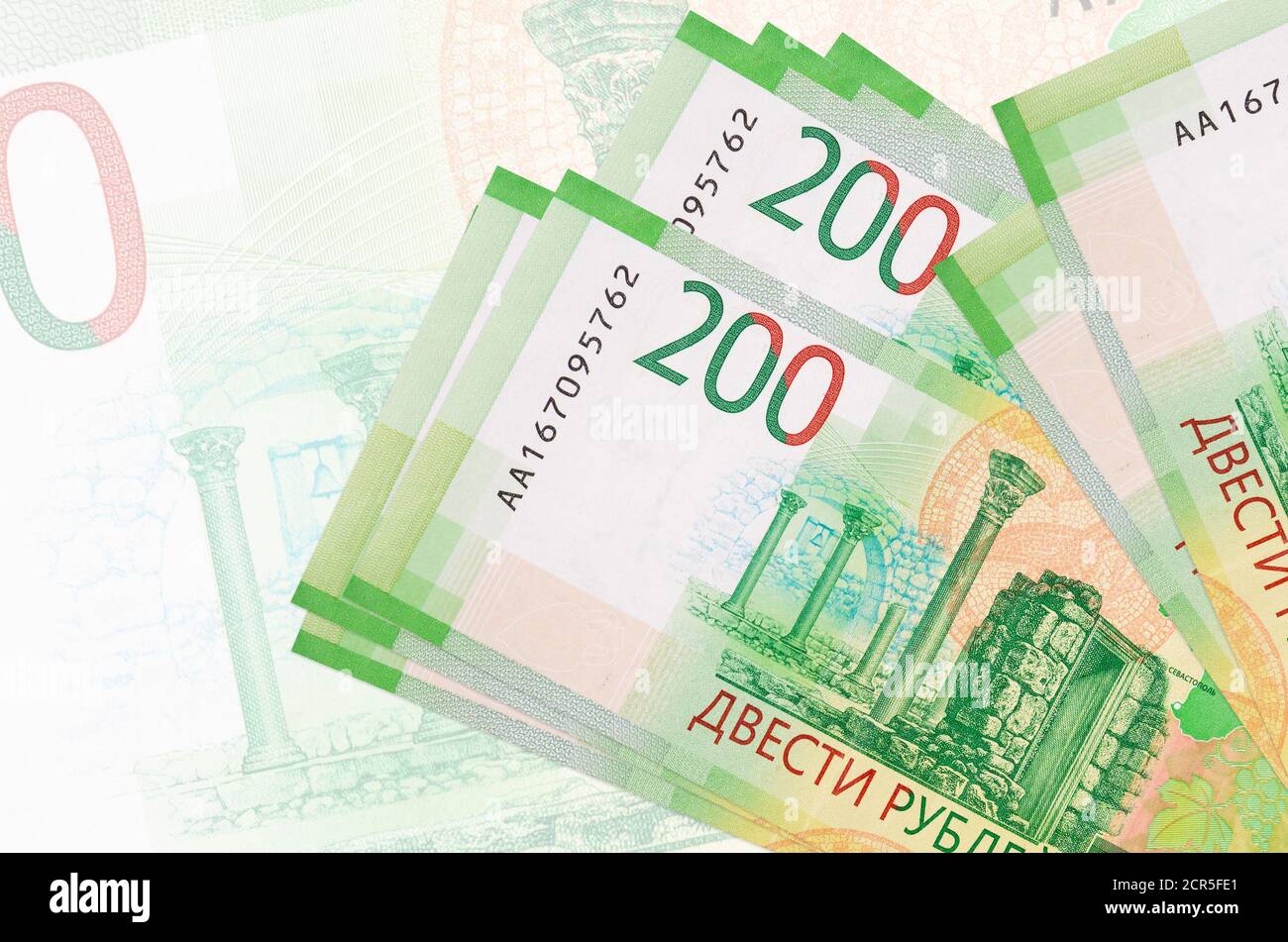 200 russian rubles bills lies in stack on background of big semi ...