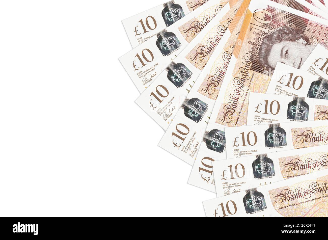 10 British pounds bills lies isolated on white background with copy ...