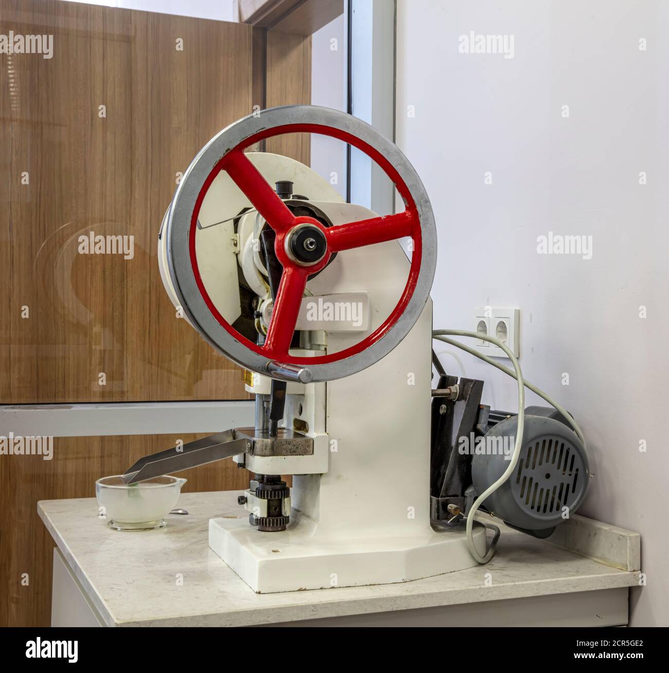 drug capsule and pill press machine in medicine manufacturing factory ...