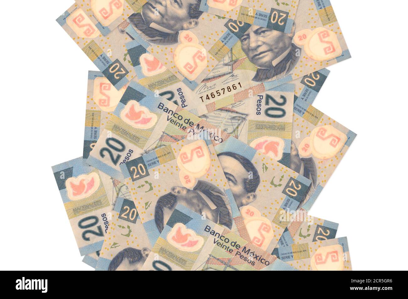 20 Mexican pesos bills flying down isolated on white. Many banknotes ...
