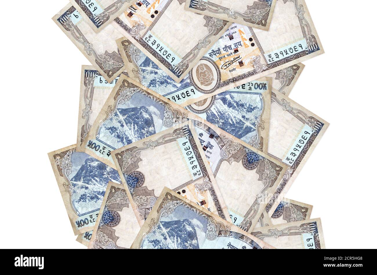 500 Nepalese rupees bills flying down isolated on white. Many banknotes falling with white copy ...