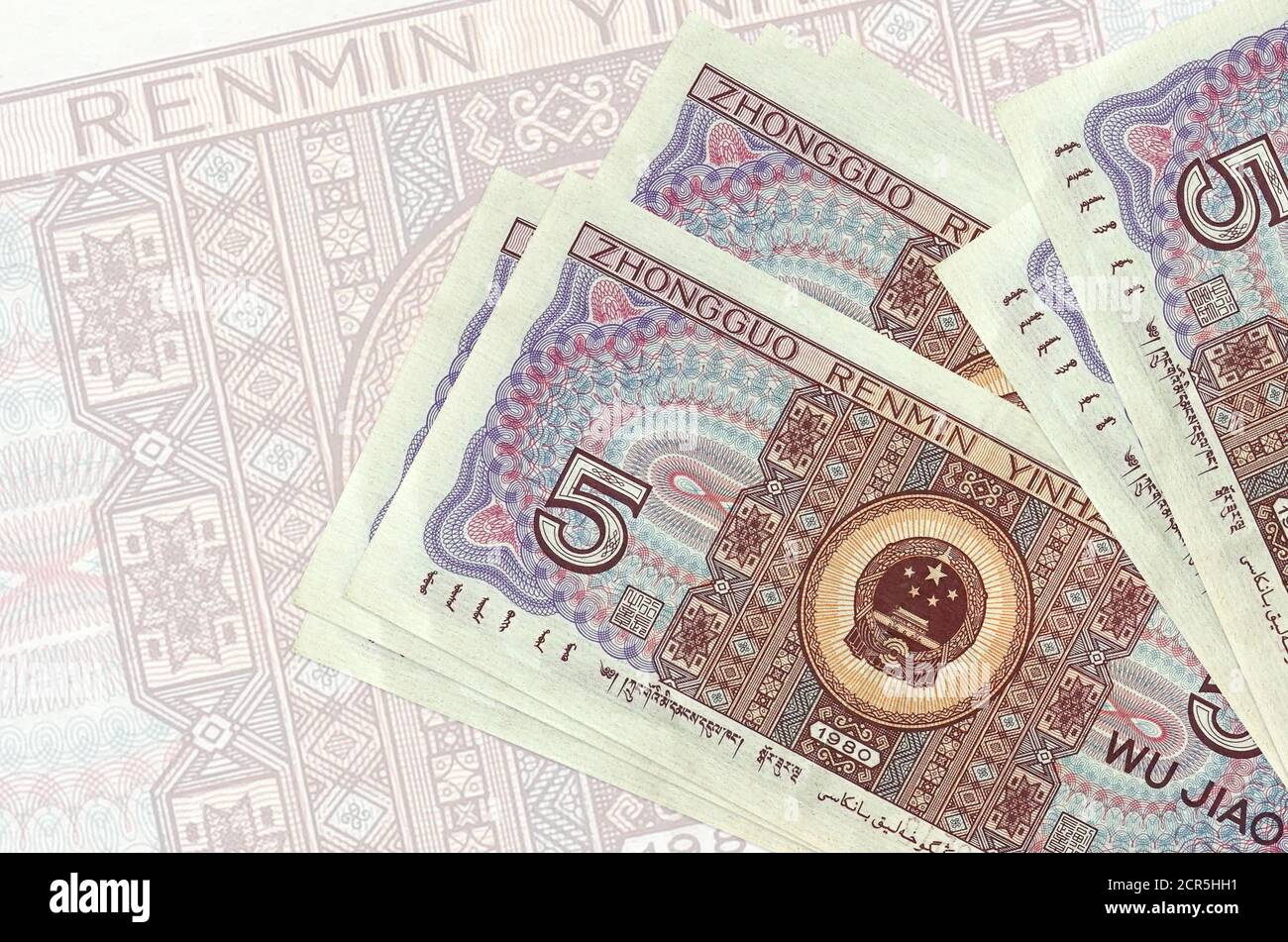 5 Chinese yuan bills lies in stack on background of big semi ...