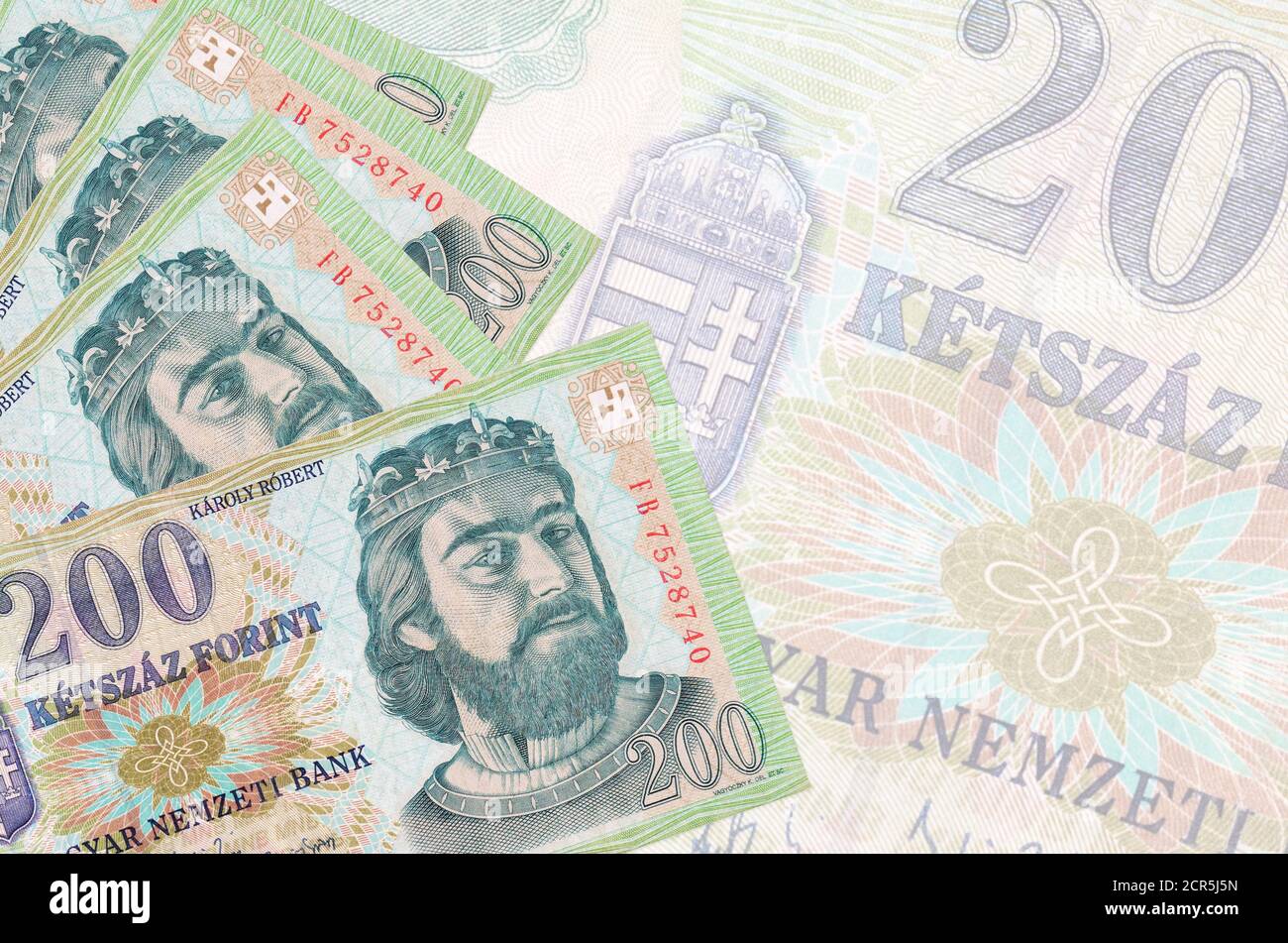 200 Hungarian forint bills lies in stack on background of big semi ...