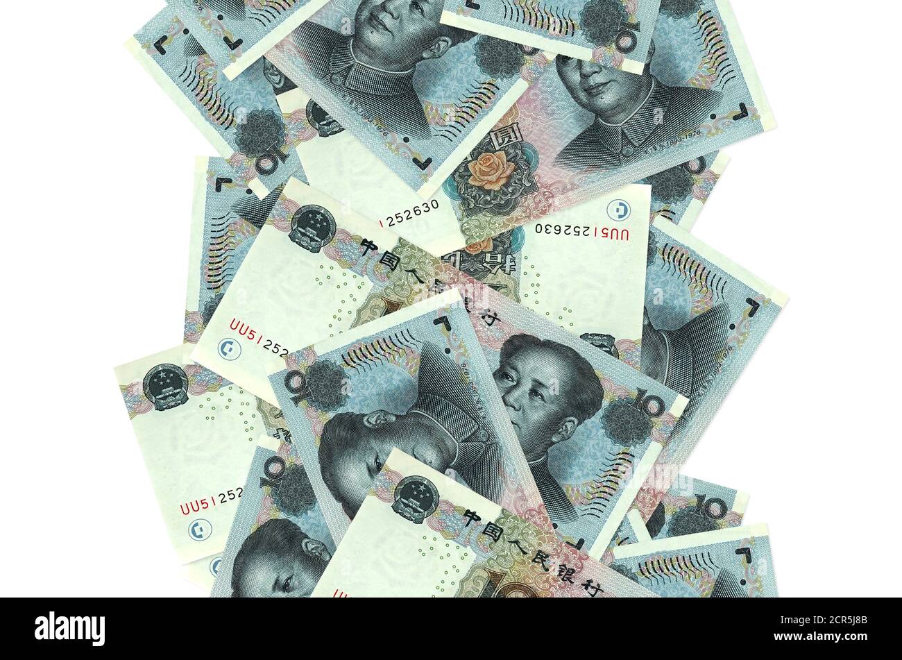 10 Chinese yuan bills flying down isolated on white. Many banknotes ...