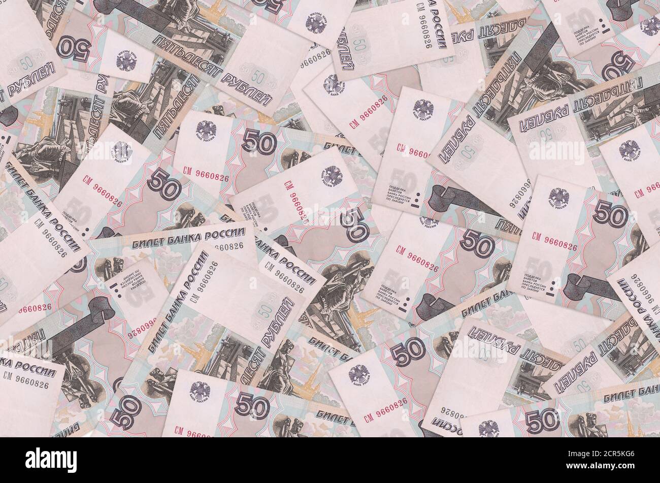 50 russian rubles bills lies in big pile. Rich life conceptual ...