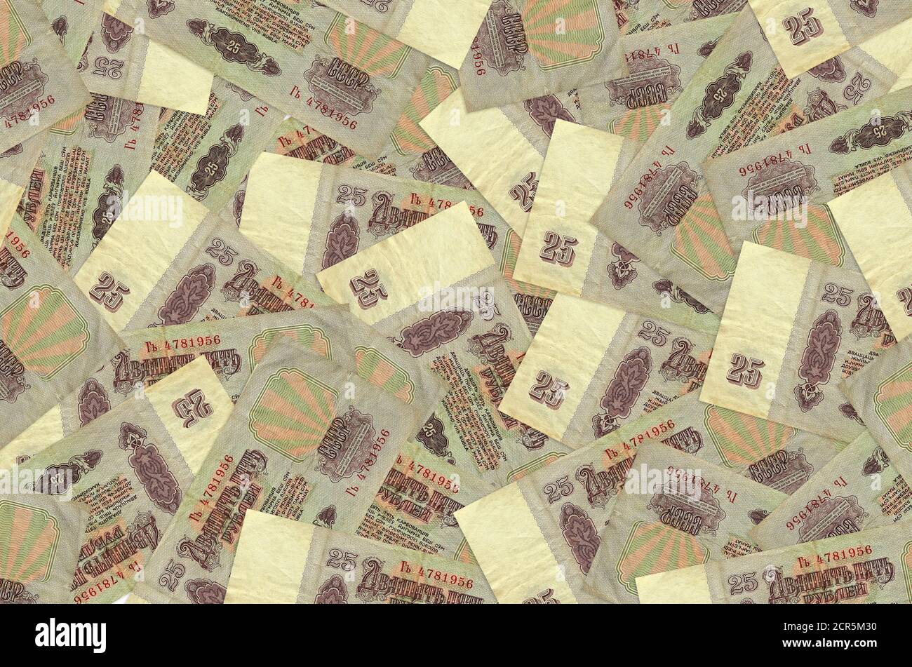 25 russian rubles bills lies in big pile. Rich life conceptual ...
