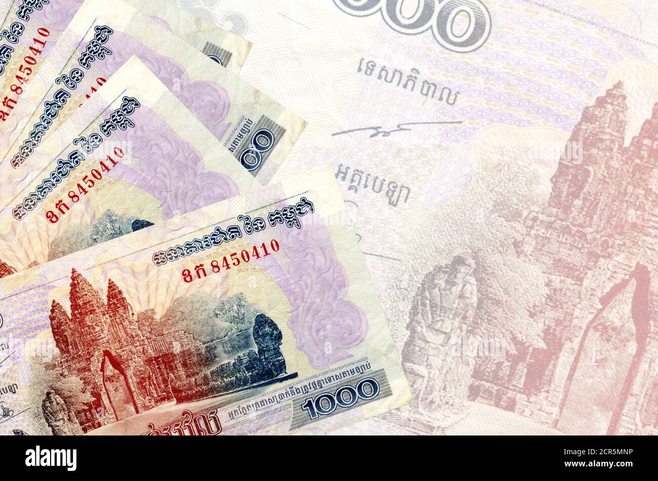 1000 Cambodian riels bills lies in stack on background of big semi ...
