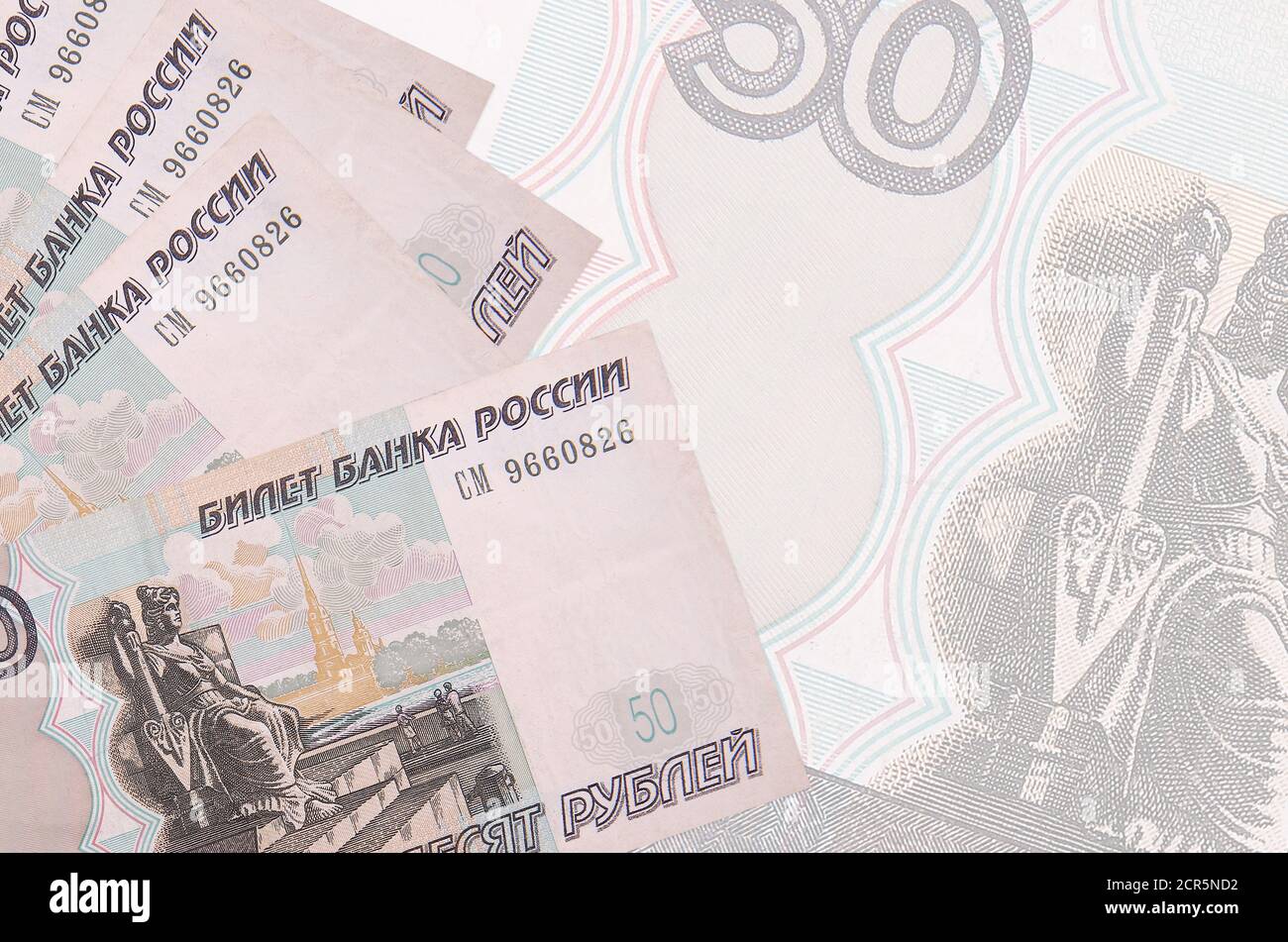 50 russian rubles bills lies in stack on background of big semi ...
