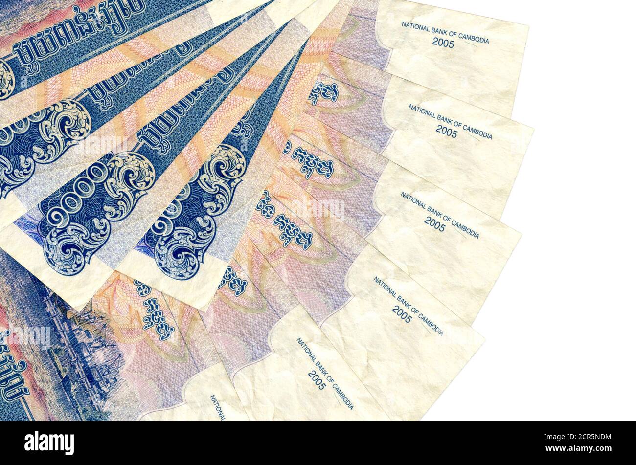 1000 Cambodian riels bills lies isolated on white background with copy ...