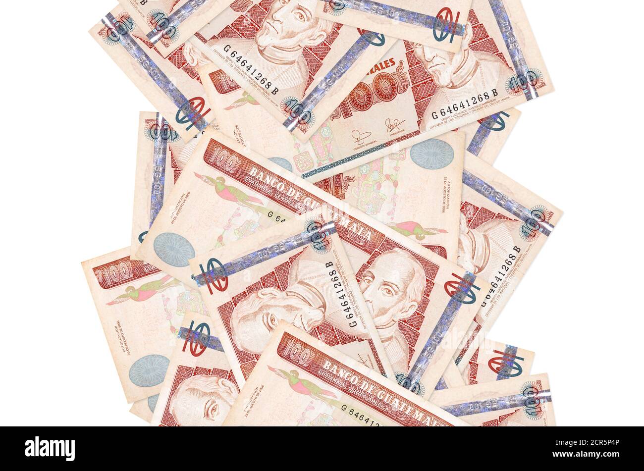 100 Guatemalan quetzales bills flying down isolated on white. Many ...