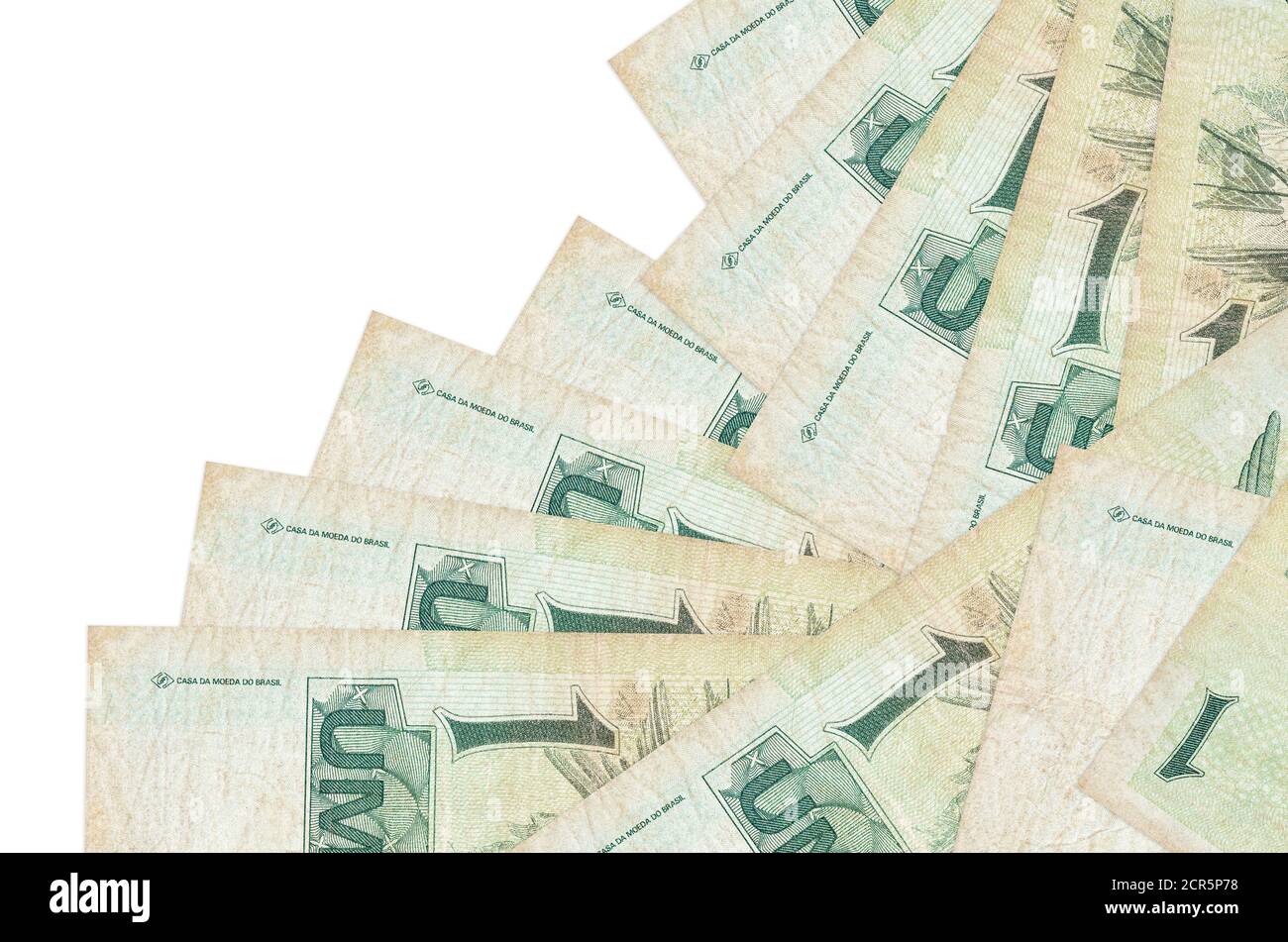 1 Brazilian real bills lies in different order isolated on white. Local ...