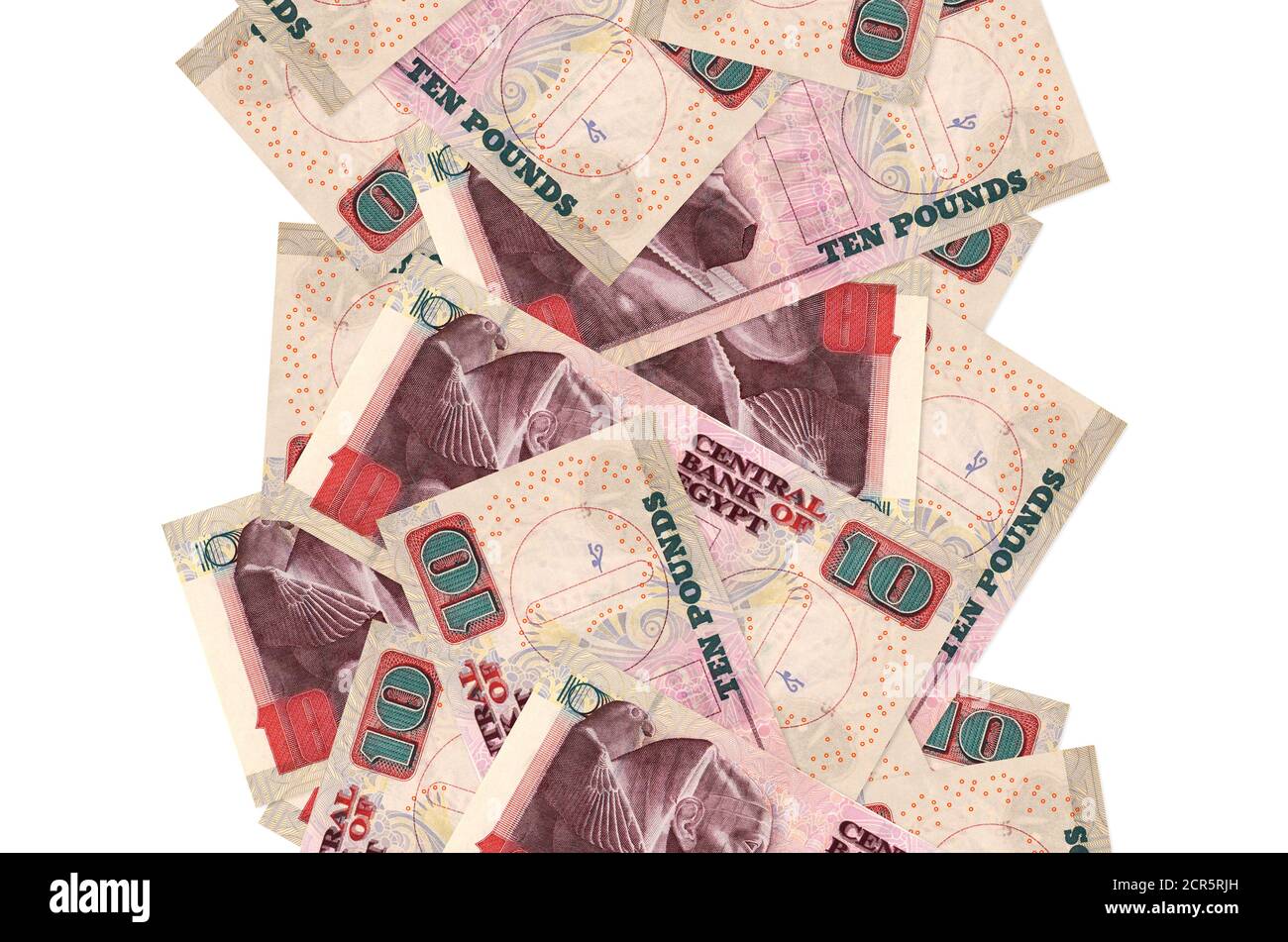 10 Egyptian pounds bills flying down isolated on white. Many banknotes ...