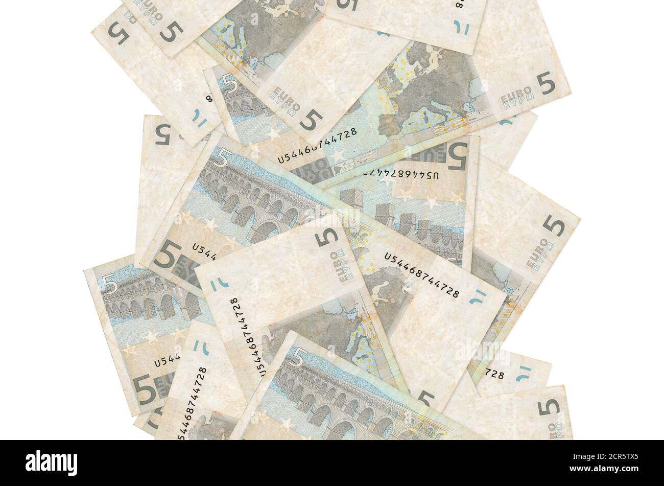 5 euro bills flying down isolated on white. Many banknotes falling with ...