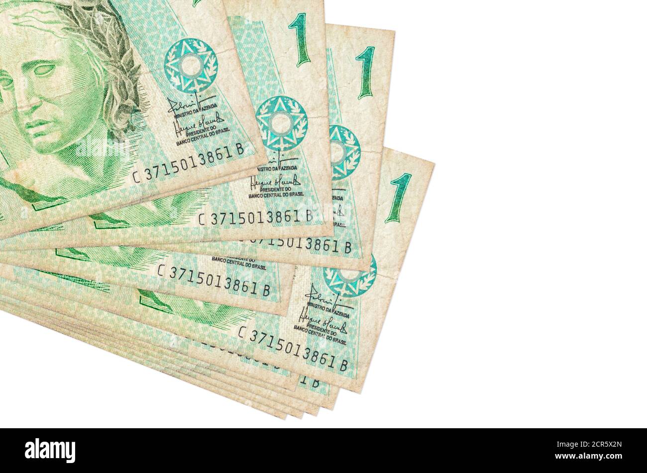 1 Brazilian real bills lies in small bunch or pack isolated on white ...