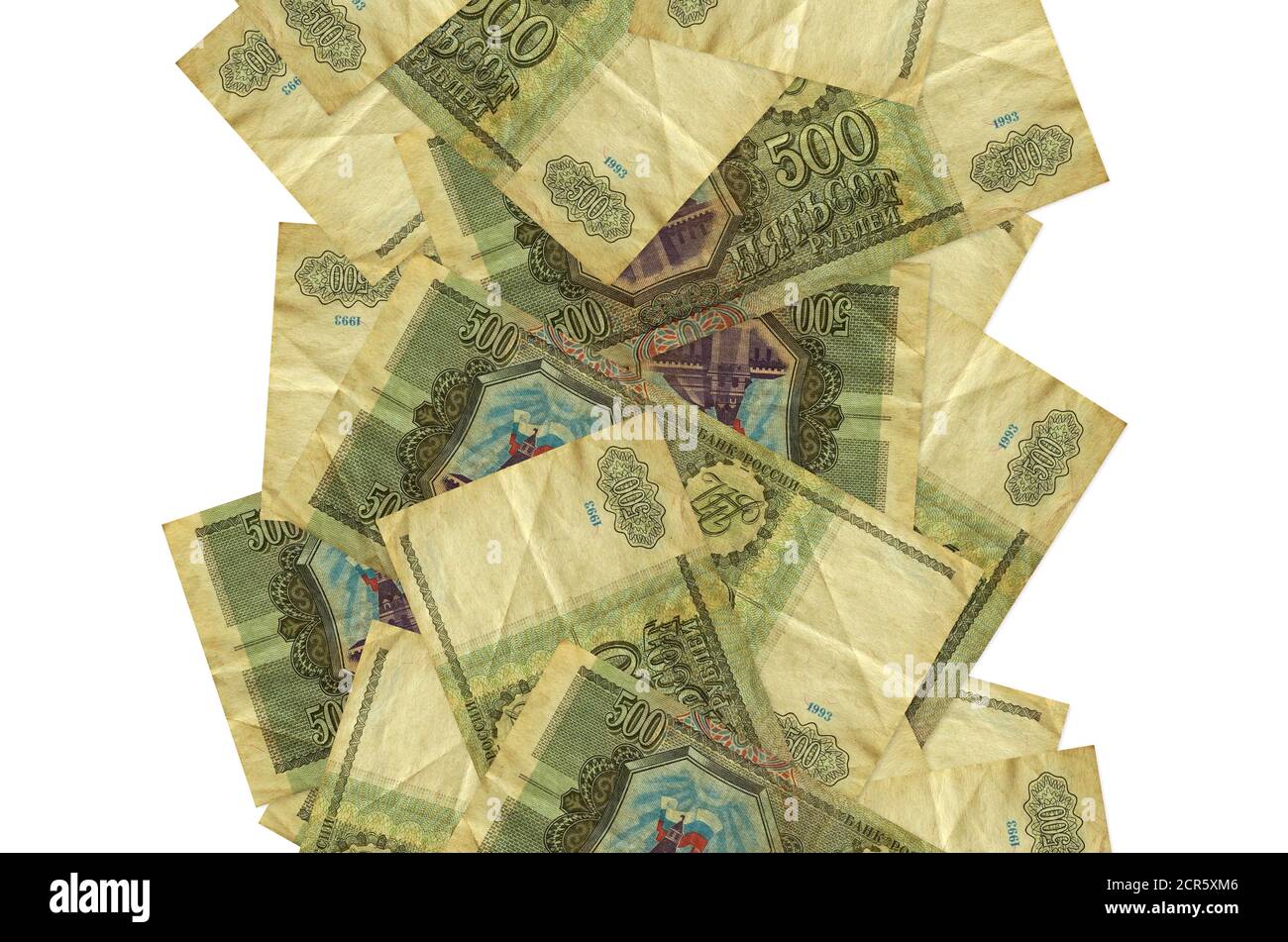500 russian rubles bills flying down isolated on white. Many banknotes ...